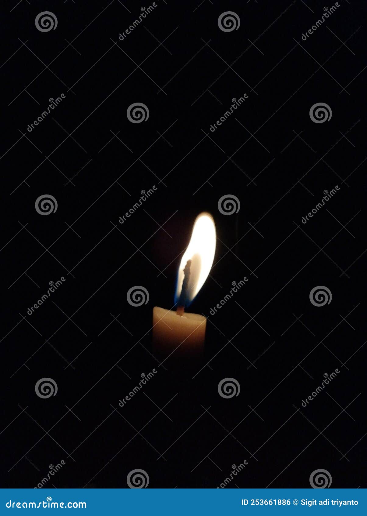 A fire from a candle stock photo. Image of night, candle - 253661886