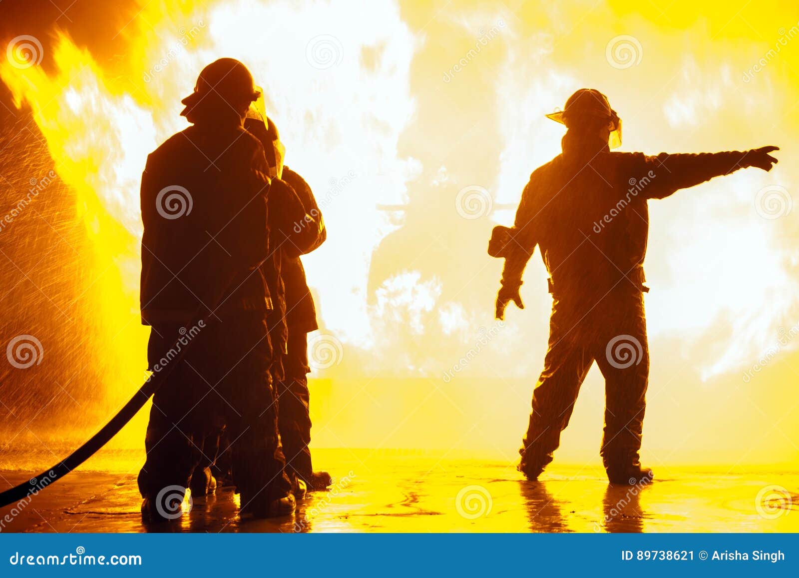 Fire Chief Pointing To the Right during a Firefighting Exercise ...