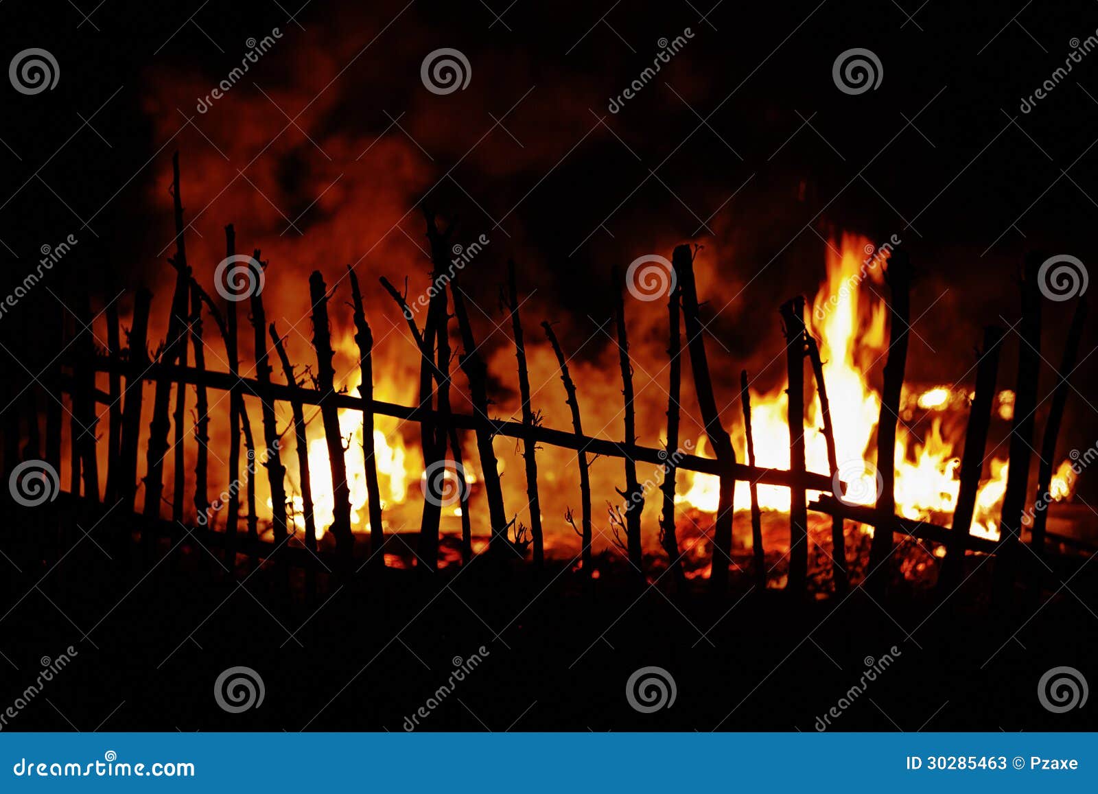 Fire in Countryside with Wooden Fence in Foreground Stock Image - Image ...