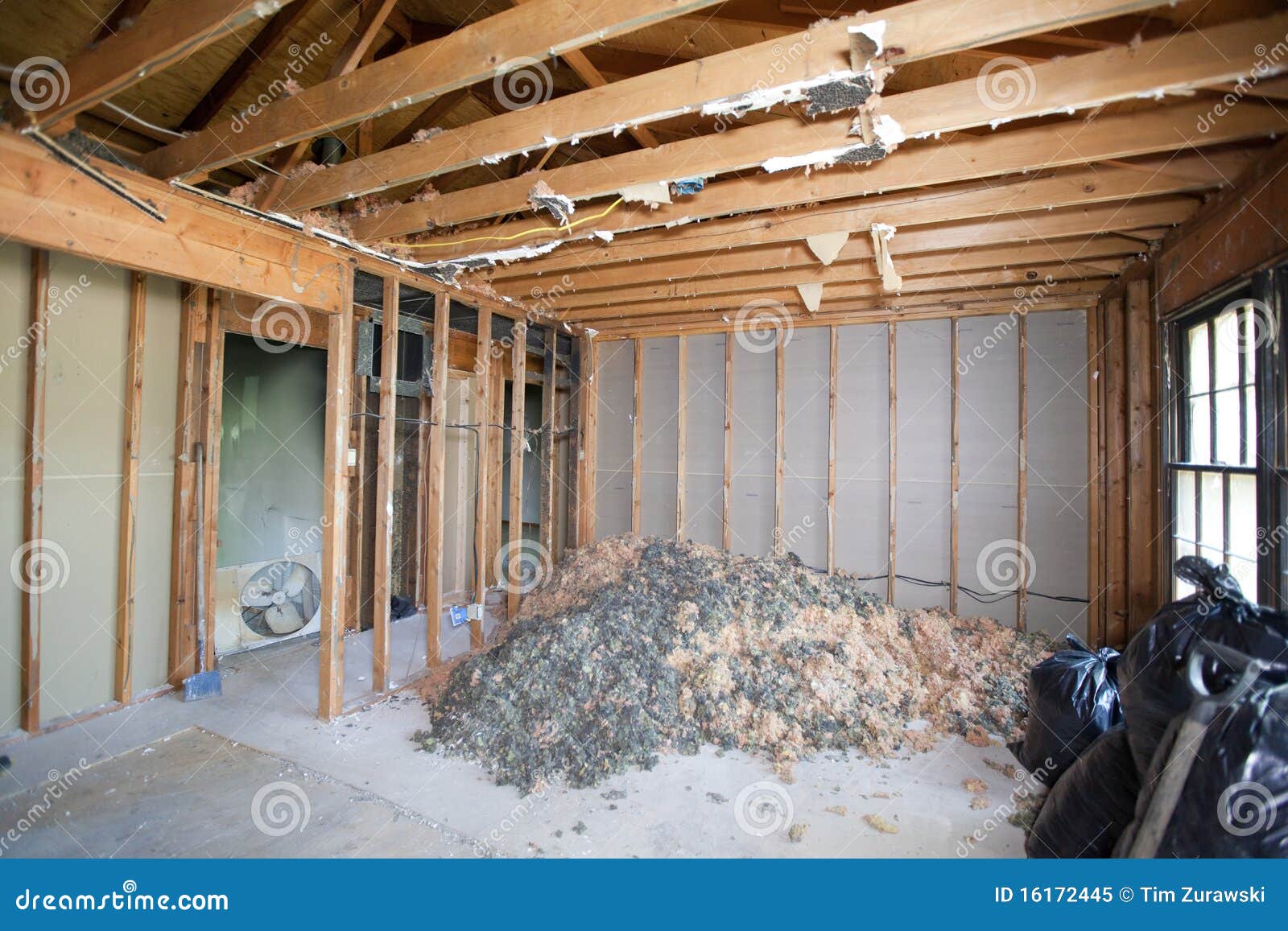 Fire Damaged and Gutted Room Stock Image - Image of insulation, fire ...