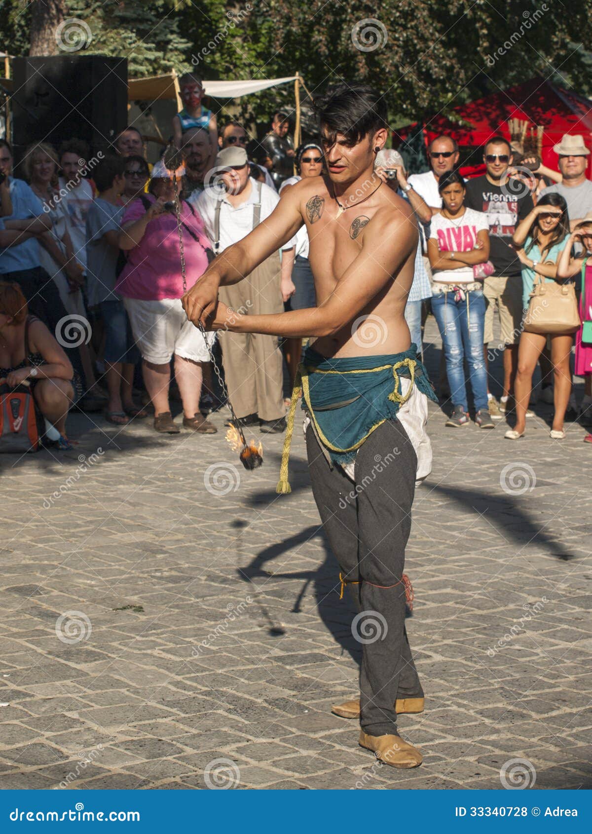Fire dancer with a torch editorial stock photo. Image of medieval ...