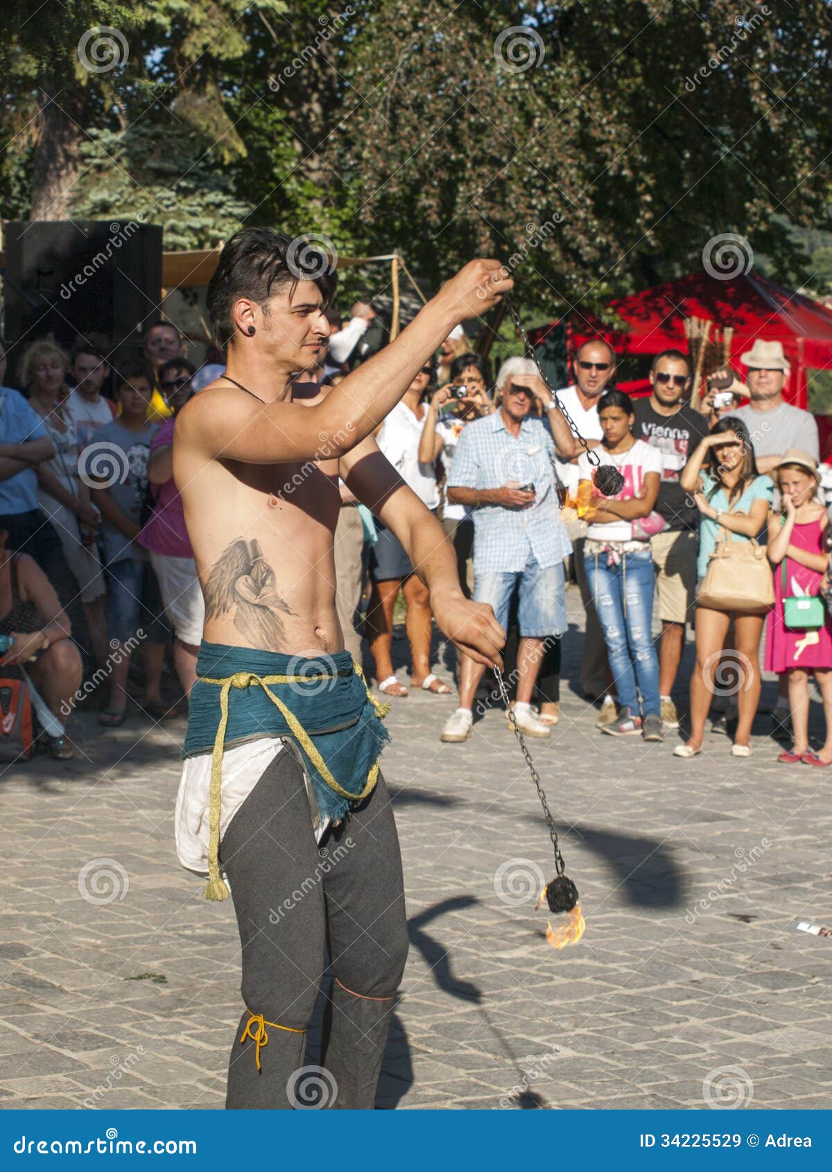 Fire dancer with a torch editorial stock image. Image of courage - 34225529