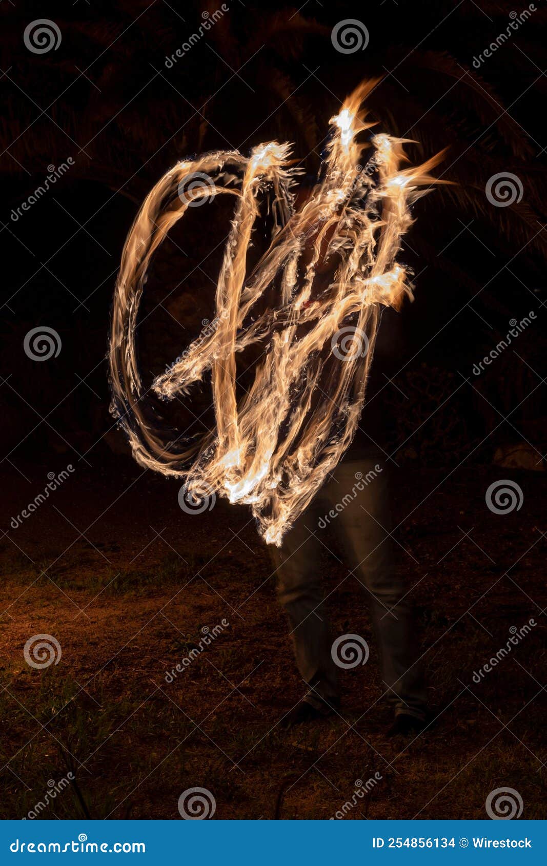 Fire Dancer Spins Fire on Balls with Chains Stock Photo - Image of ...