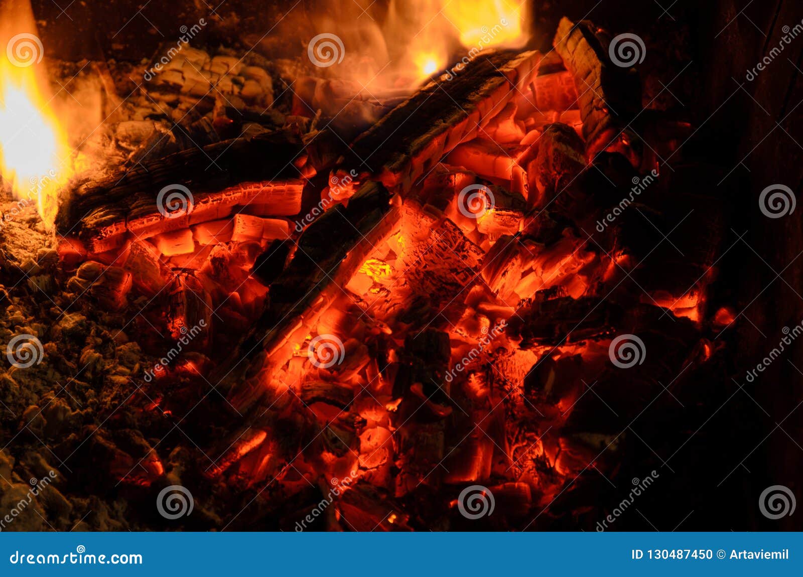 Fire in the dark stock photo. Image of glowing, natural - 130487450