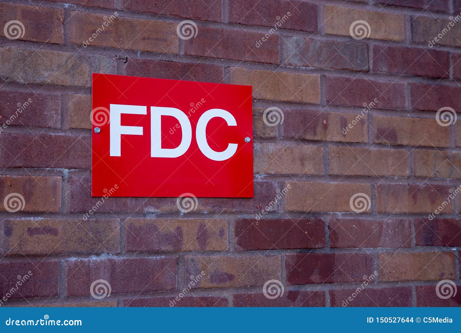 Fire Department Connection Sign on Brick Wall of Building Stock Photo ...