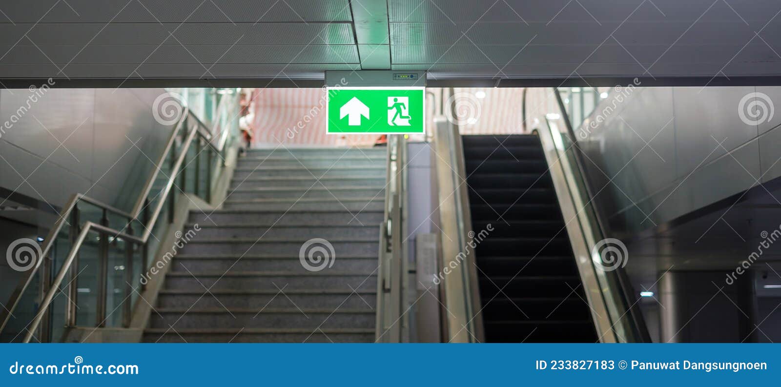 Fire Emergency Exit Sign on the Wall Inside Building at Subway Train ...