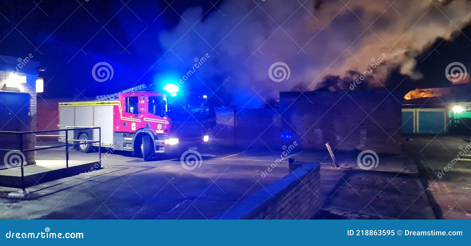 Fire Engine in Action at Night Small Fire a Lot of Smoke Editorial ...