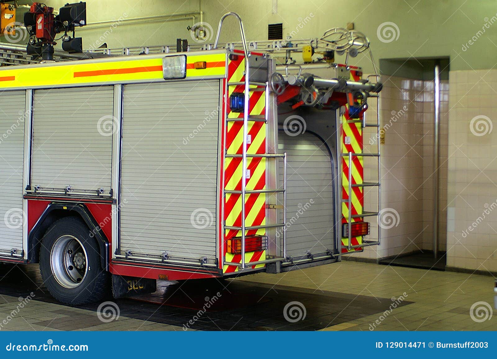 Fire engine on blue light stock image. Image of light - 129014471