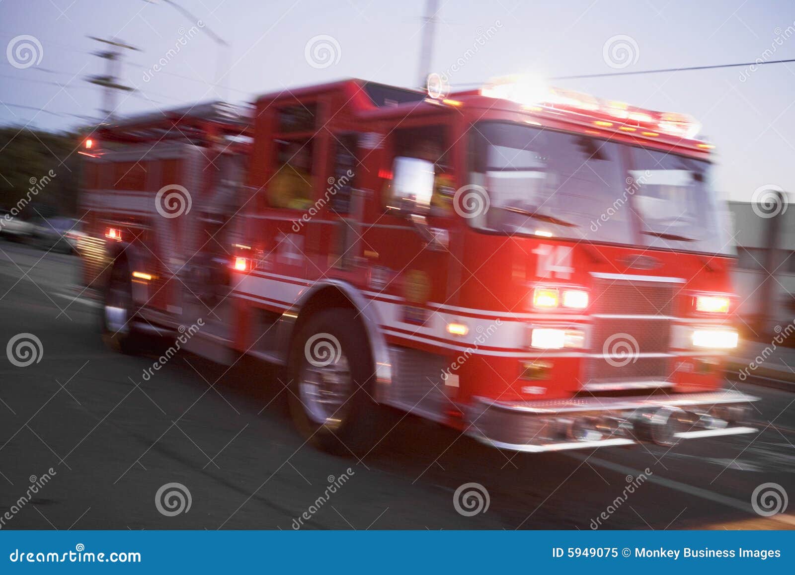Fire Engine Driving Down Street Stock Image - Image of answering ...