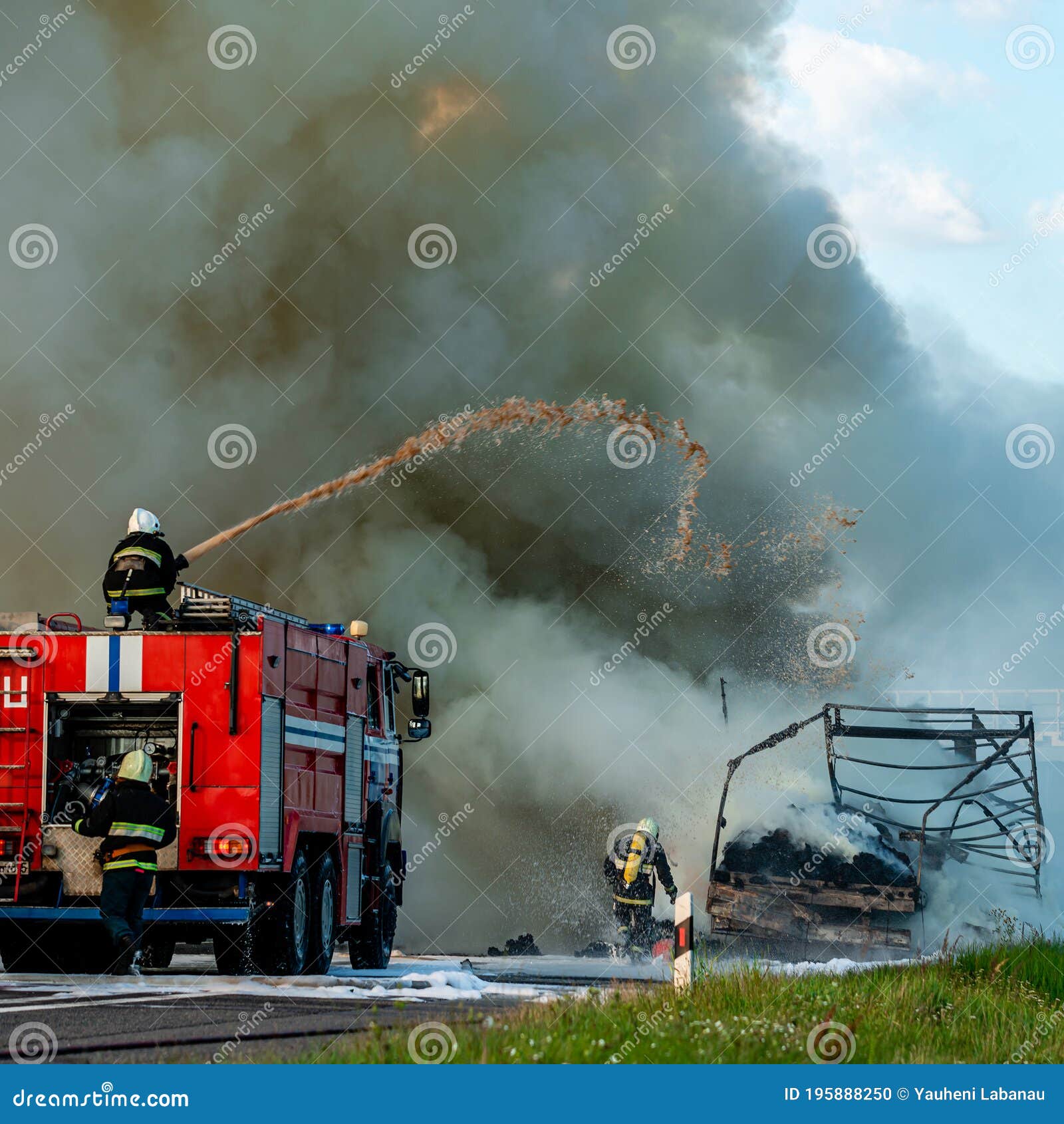 Fire Engine Extinguishes a Fire on the Road Stock Photo - Image of ...