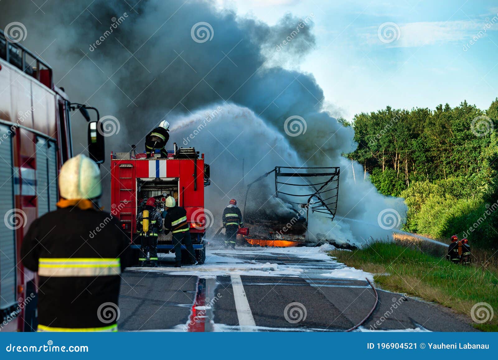 Fire Engine Extinguishes a Fire on the Road Stock Image - Image of ...