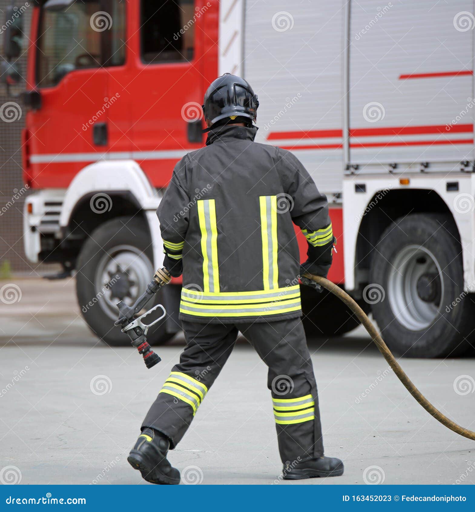 Fire Engine and the Fireman Stock Image - Image of firefighting, engine ...