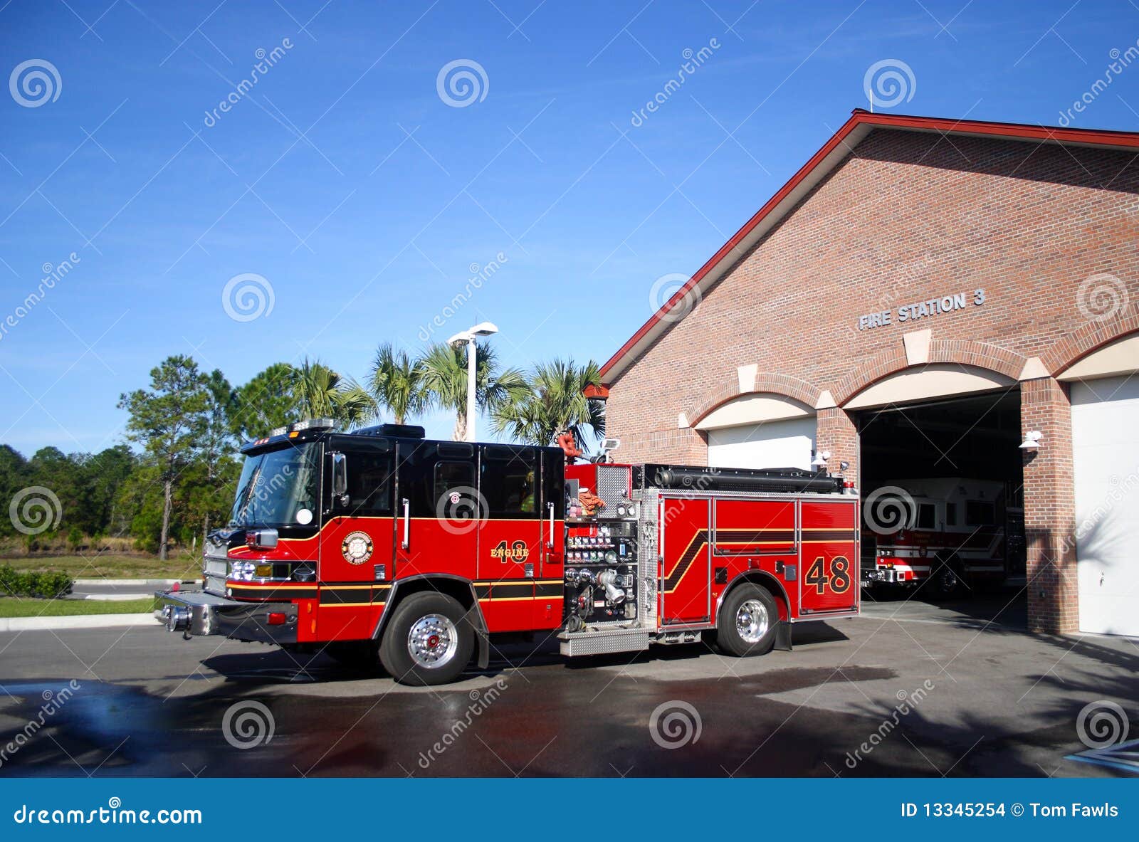 Fire Engine Parked in Front of Station Number 3 Stock Photo - Image of ...