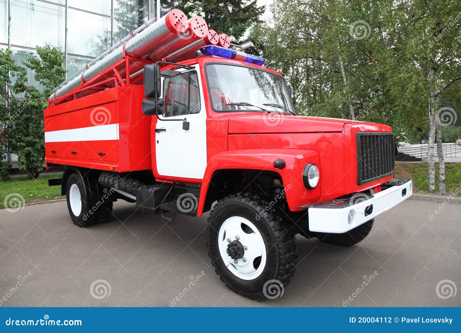 Fire Engine with Pipes and Flasher on the Roof Stock Photo - Image of ...