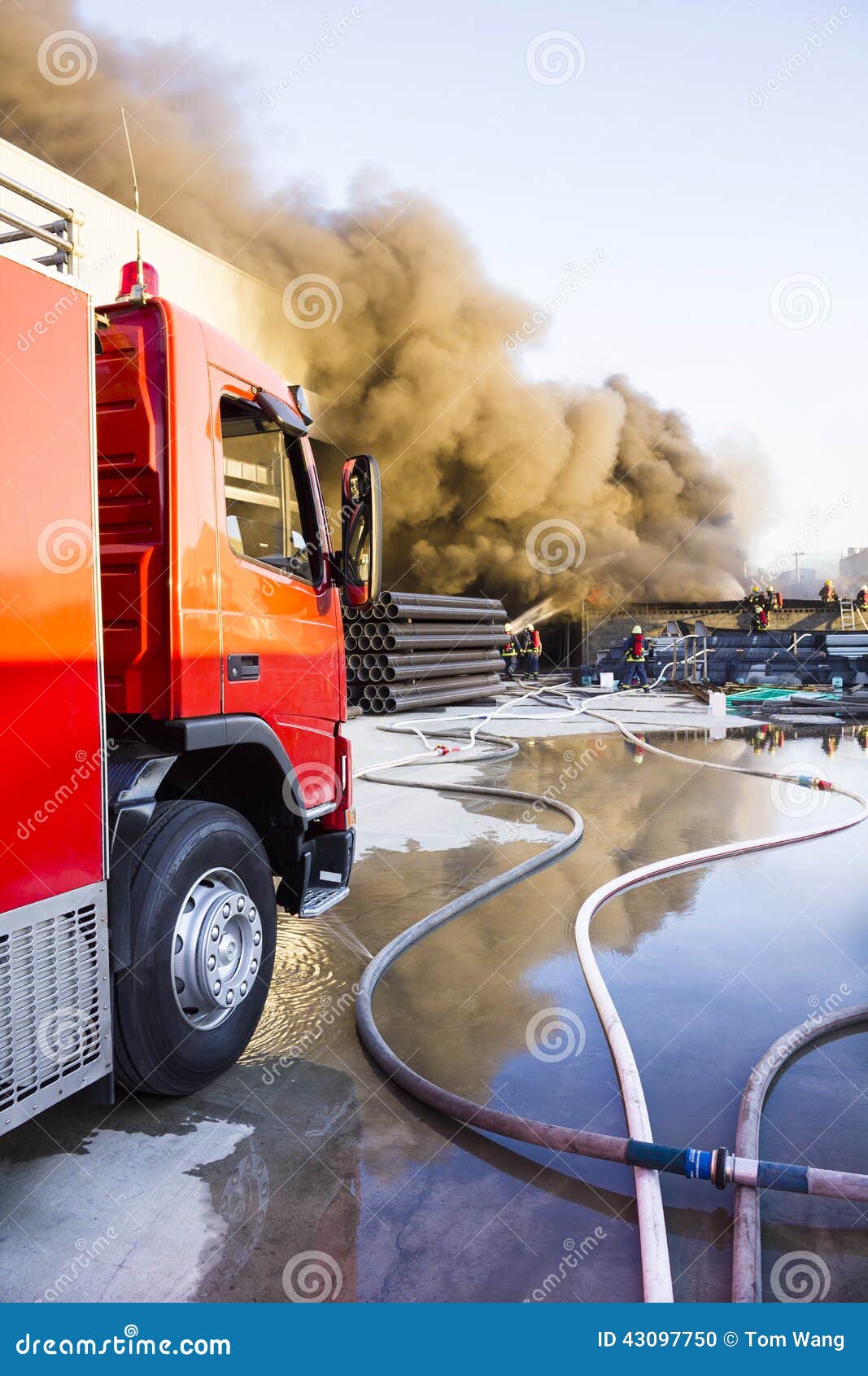 Fire Engine with the Plant Fire Background Stock Photo - Image of ...