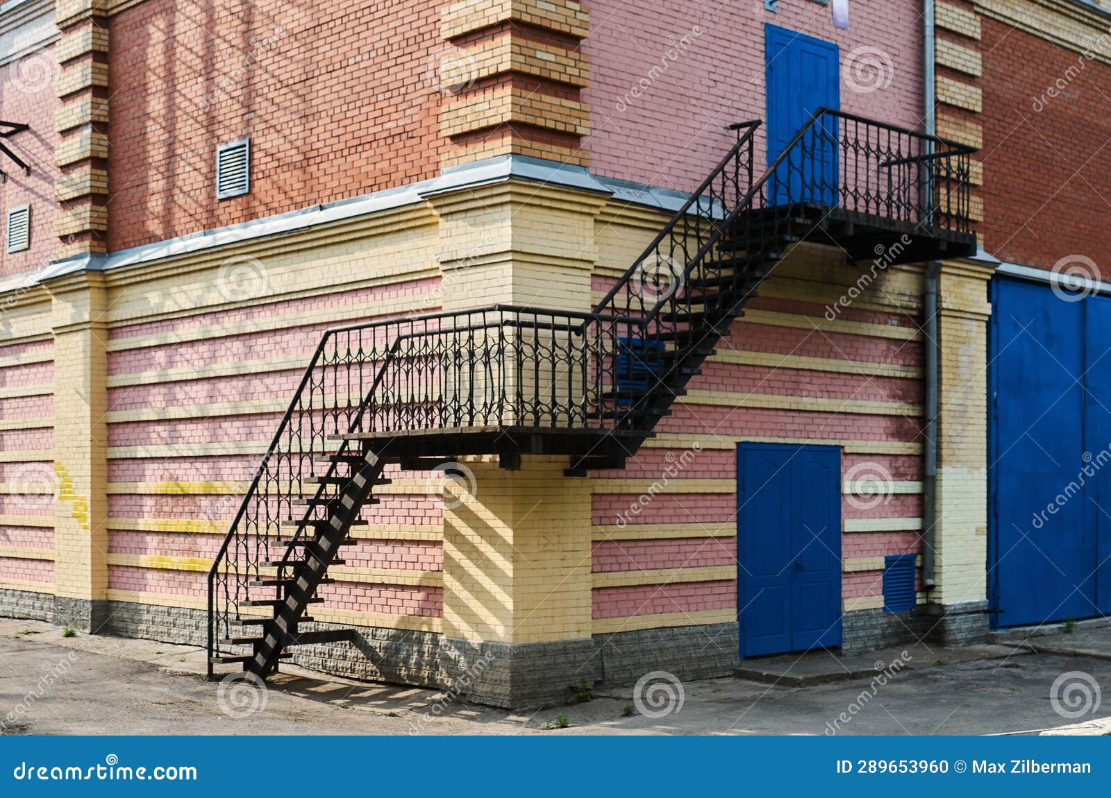 Fire Escape at the Corner of a Brick Transformer Box Stock Photo ...