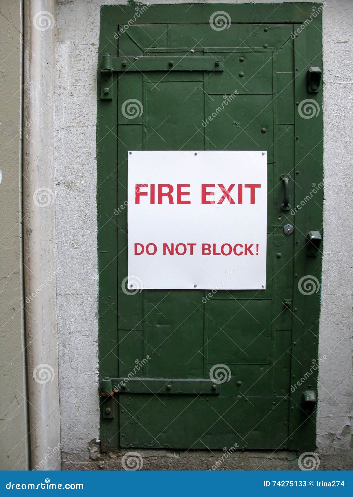 Fire Exit Do Not Block! Sign on a Green Door Stock Image - Image of ...
