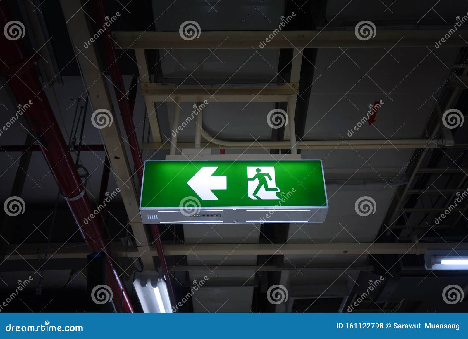 Fire exit in factory. stock photo. Image of colorful - 161122798