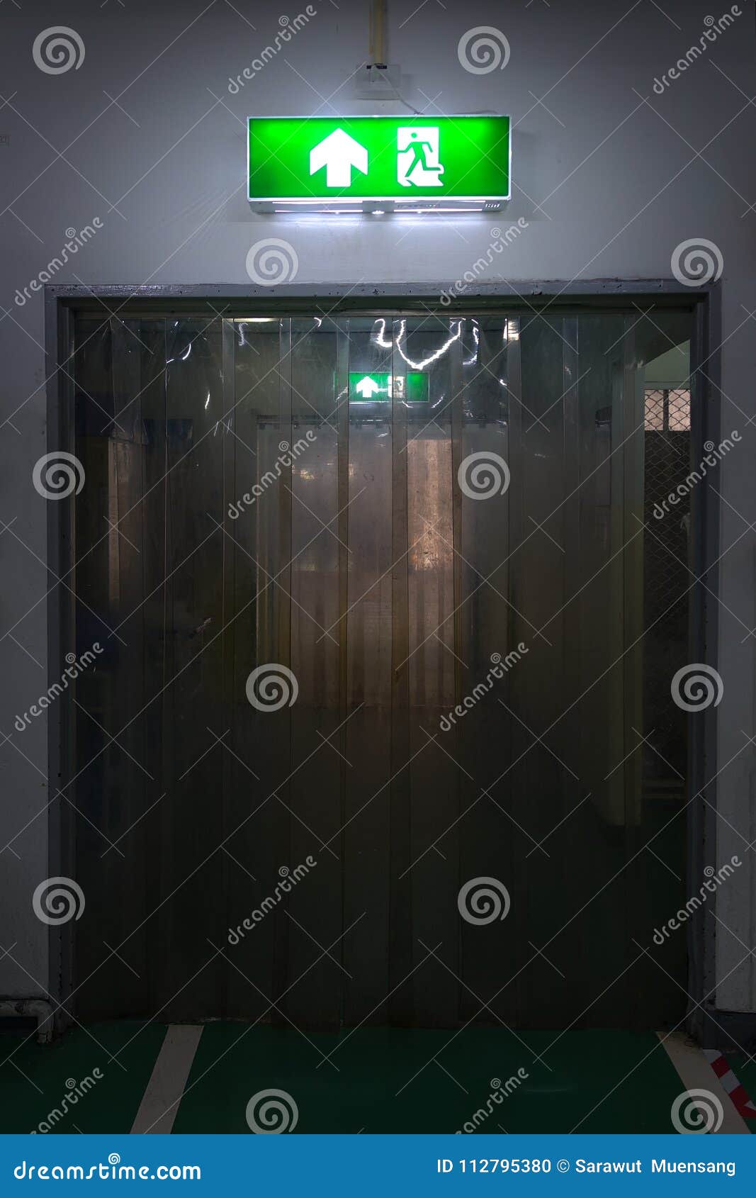 Fire exit in factory. editorial image. Image of cookie - 112795380