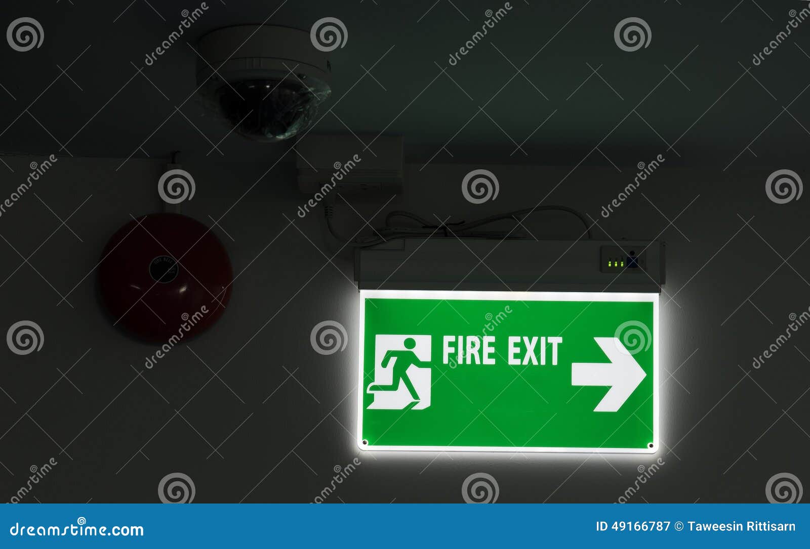 Fire Exit Guide Post on the Black Background Stock Image - Image of ...