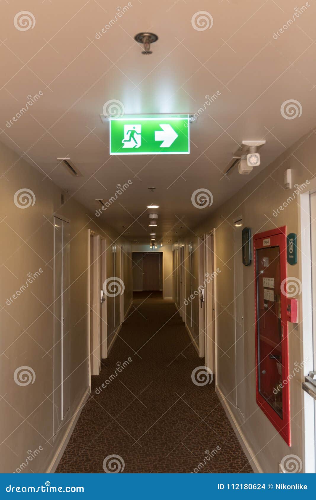 Fire exit light sign. stock photo. Image of building - 112180624