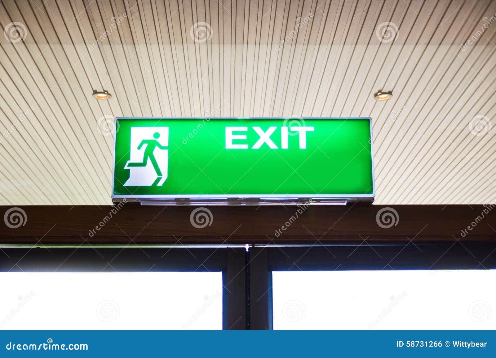 Fire exit light sign stock photo. Image of device, building - 58731266