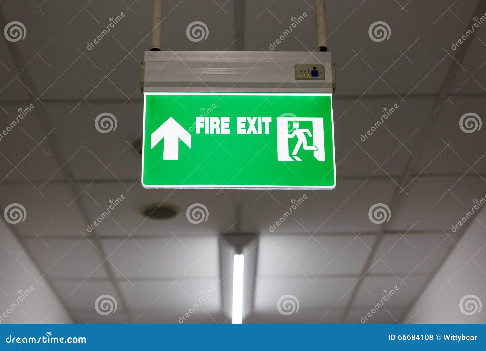 Fire exit light sign stock photo. Image of fire, security - 66684108