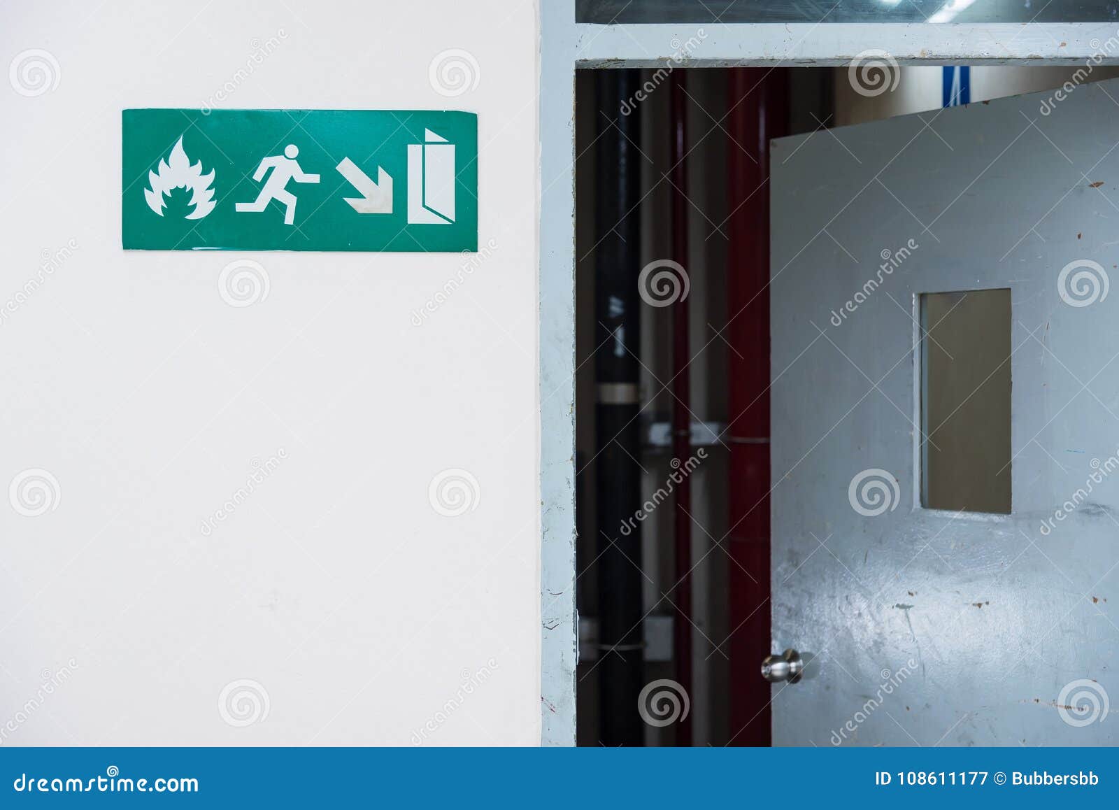 Fire Exit Sign in the Airport Terminal Emergency Exit Way.Thailand ...