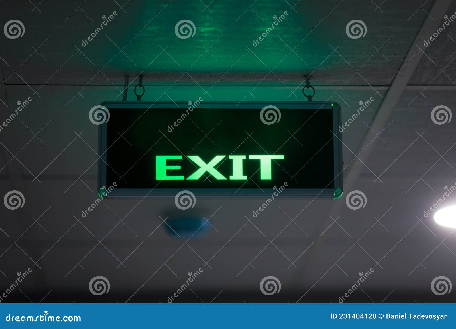 Fire Exit Sign at the Corridor Stock Photo - Image of green, danger ...