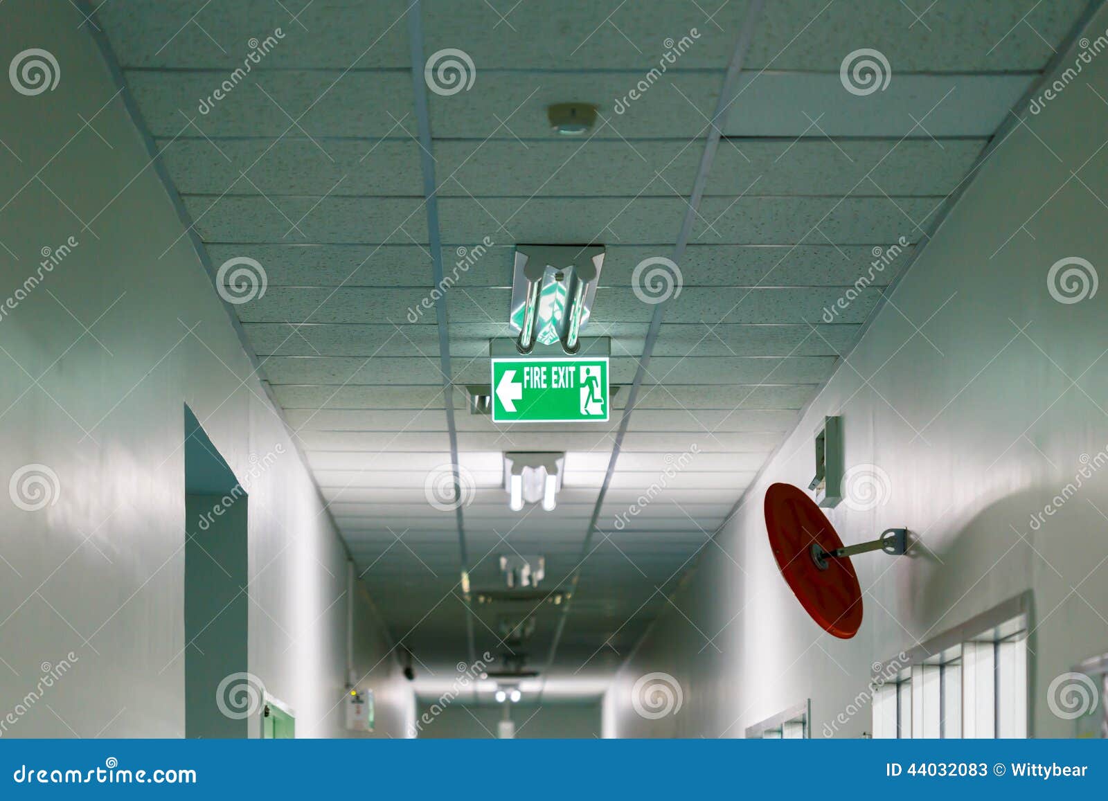 Fire exit sign in factory stock image. Image of white - 44032083