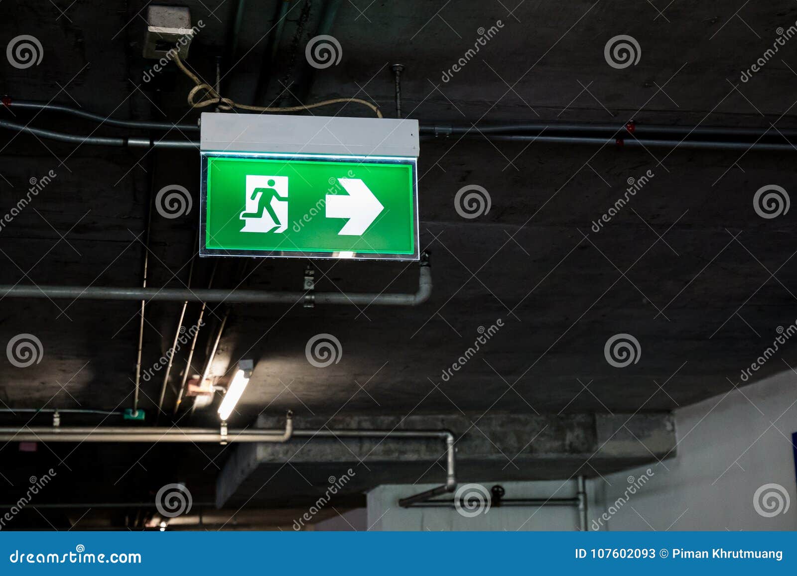 Fire exit sign stock image. Image of interior, lighting - 107602093