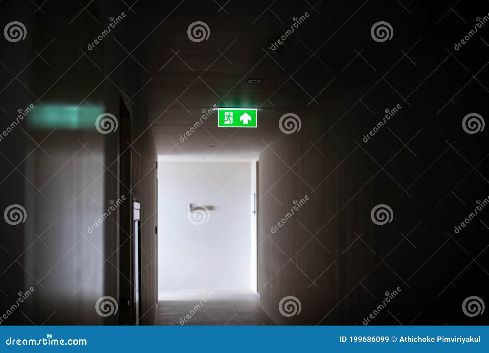 Fire Exit Sign in a Hallway of a Residential Modern Building. Stock ...