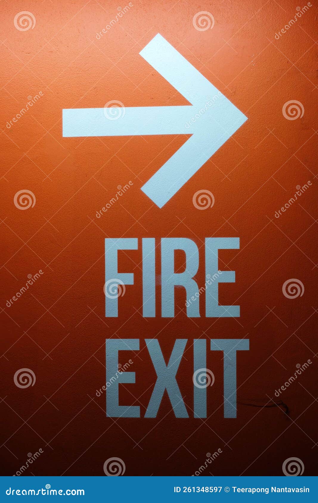 Fire Exit Sign on Red Concrete Wall Background. Stock Image - Image of ...