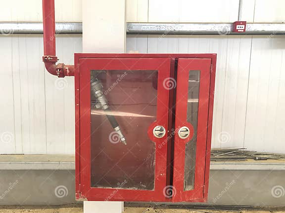 Fire Extinguisher Box with Fire Hose Inside Stock Image - Image of ...