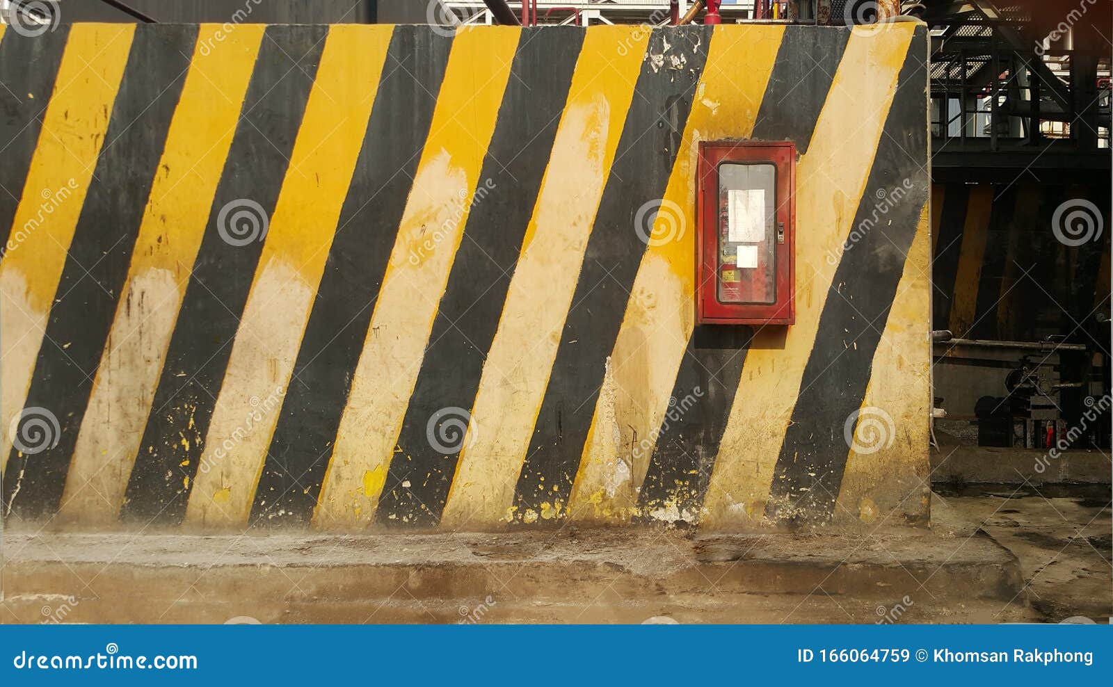 Fire Extinguisher Box on Yellow & Black Wall Stock Image - Image of ...