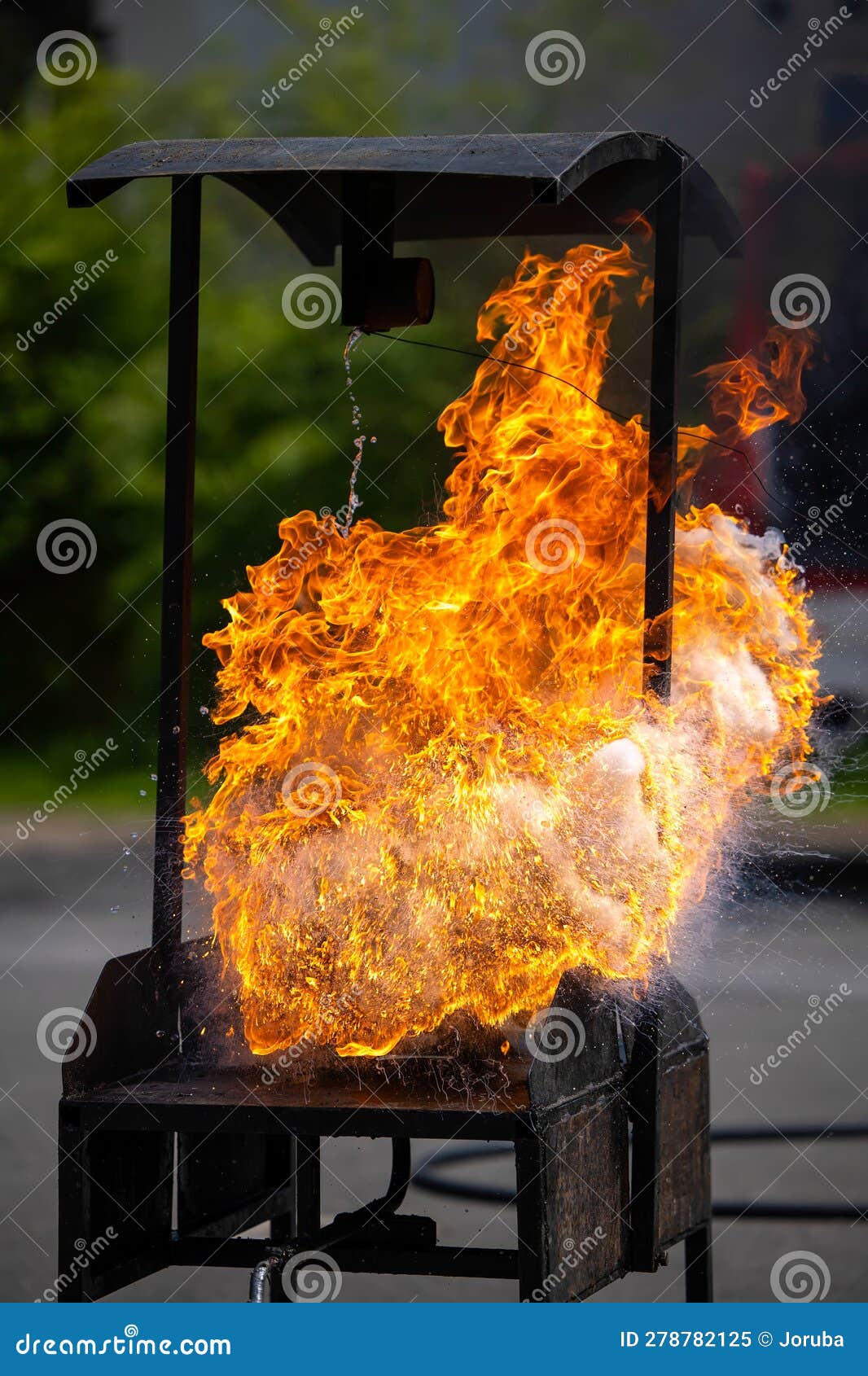 Fire Extinguisher Demonstration with Burning Fire Stock Image - Image ...