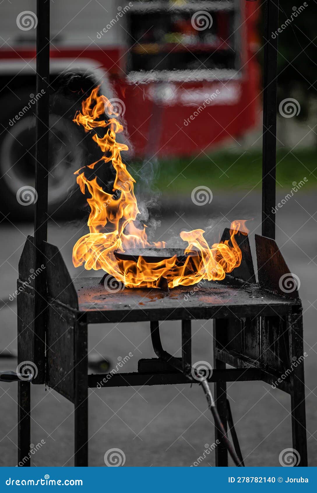 Fire Extinguisher Demonstration with Burning Fire Stock Photo - Image ...