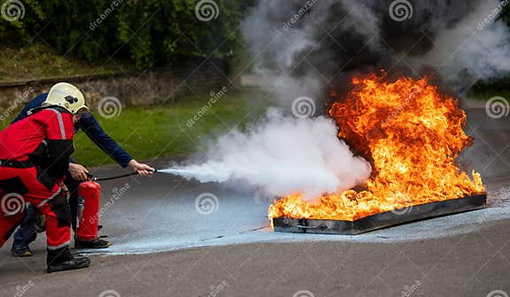 Fire Extinguisher Demonstration with Burning Fire Editorial Image ...