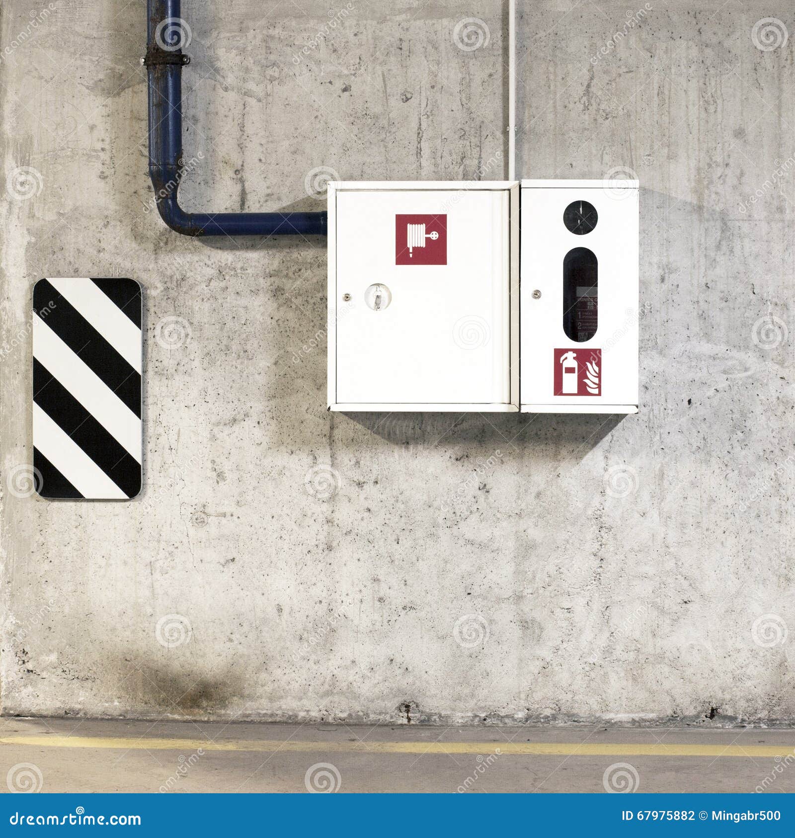A Fire Extinguisher and a Fire-hose in the White Box on the Wall Stock ...