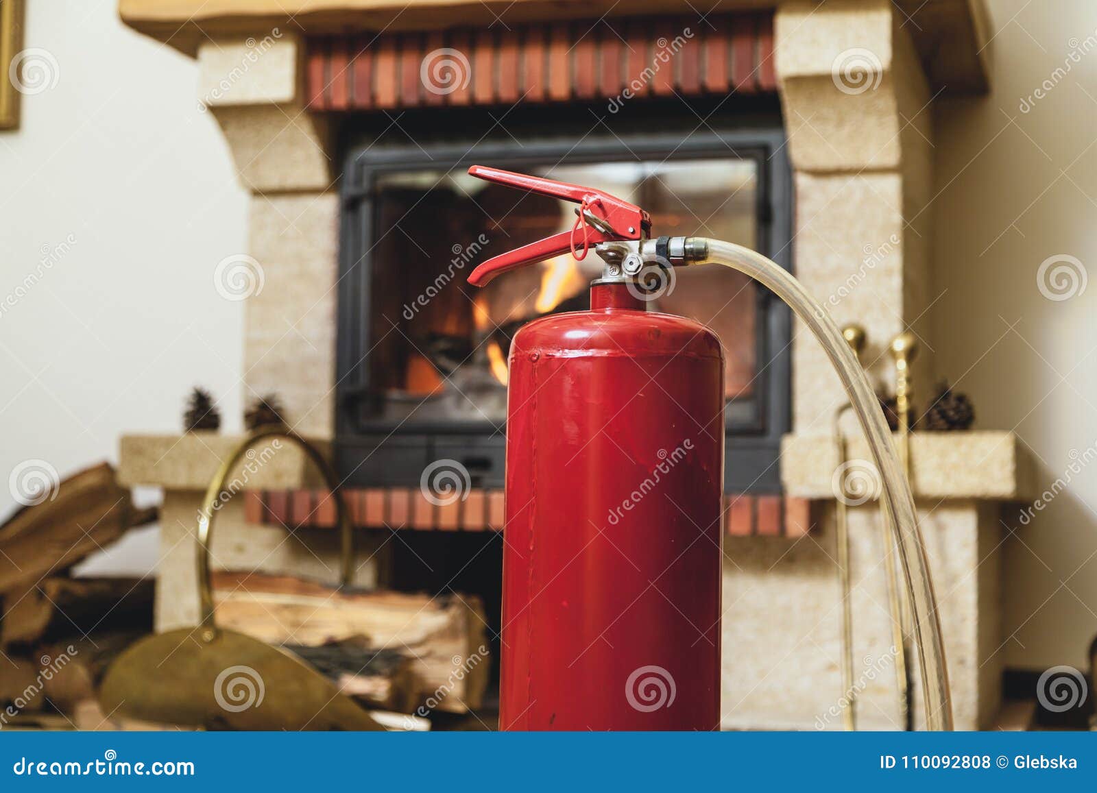 Fire Extinguisher is in Front of Fireplace Stock Photo - Image of ...