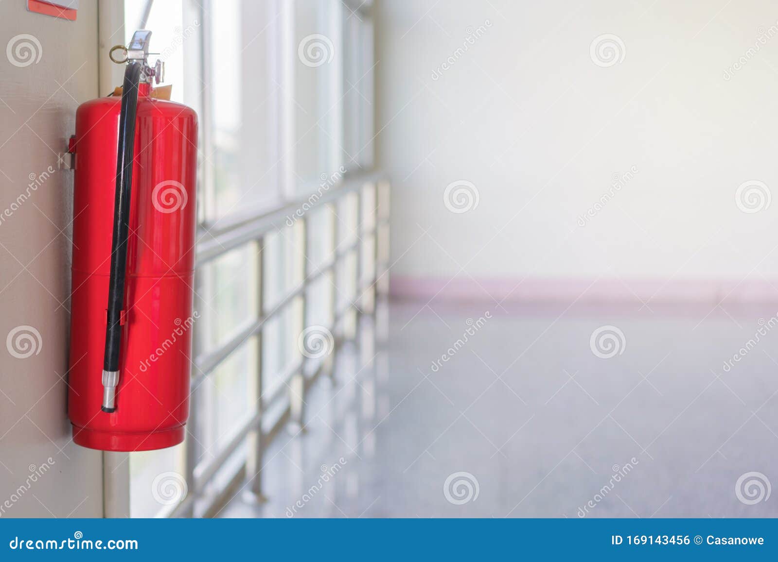 Fire Extinguisher in Front of Room at Apartment Stock Photo - Image of ...