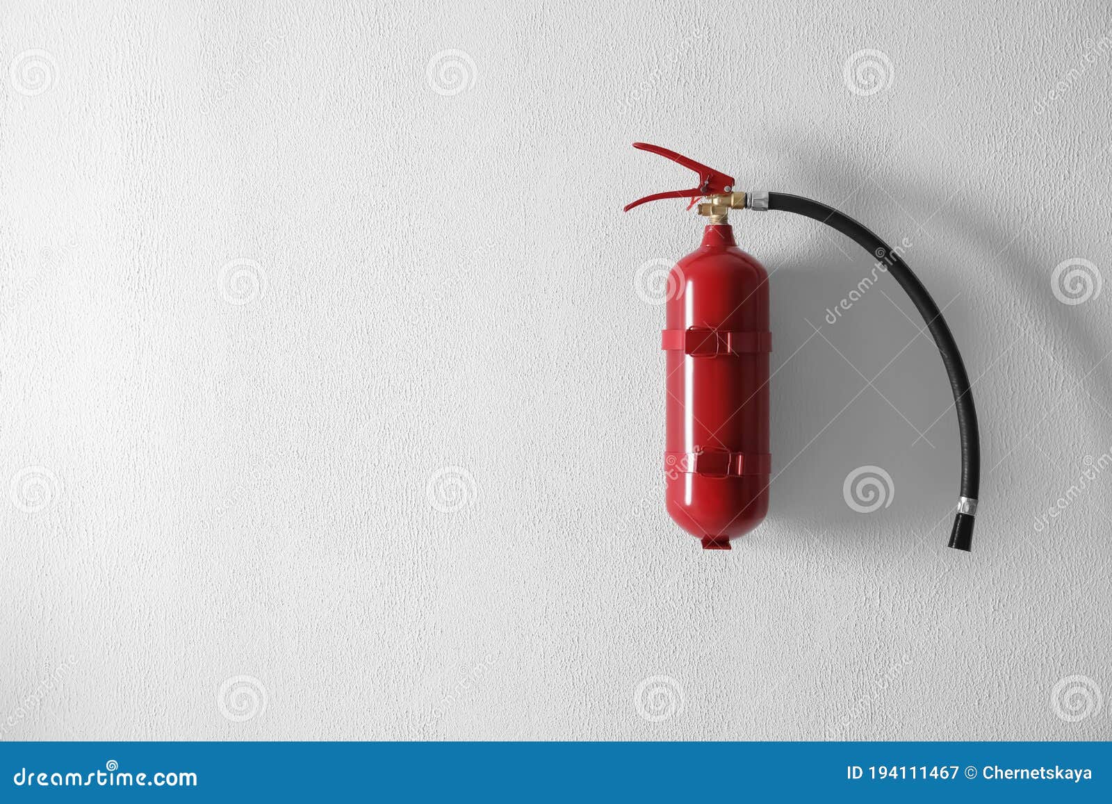 Fire Extinguisher Hanging on Wall. Space for Text Stock Image - Image ...