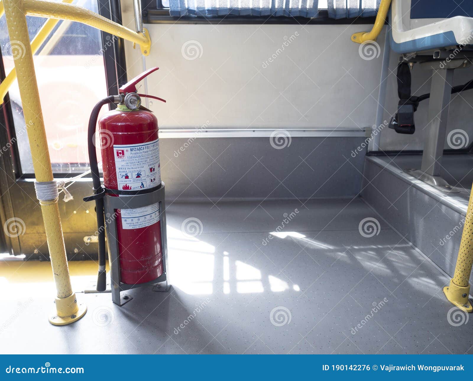 Fire Extinguisher Secured in Bracket on Bus. Stock Photo - Image of ...