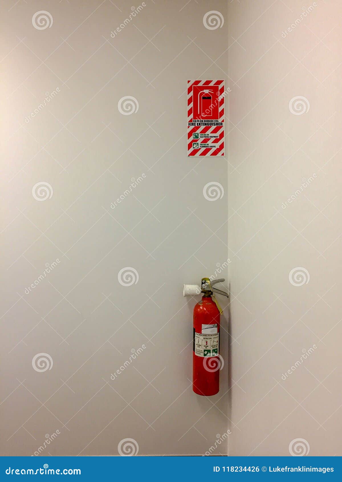 Fire Extinguisher and Sign stock photo. Image of isolated - 118234426