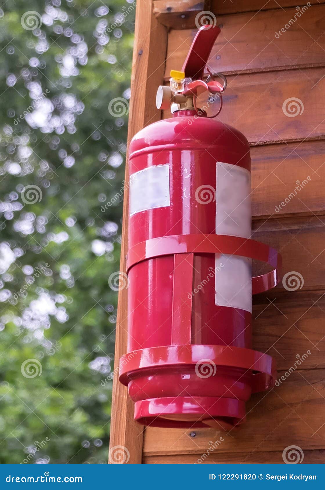 Fire Extinguisher on the Wall of the House Stock Photo - Image of ...