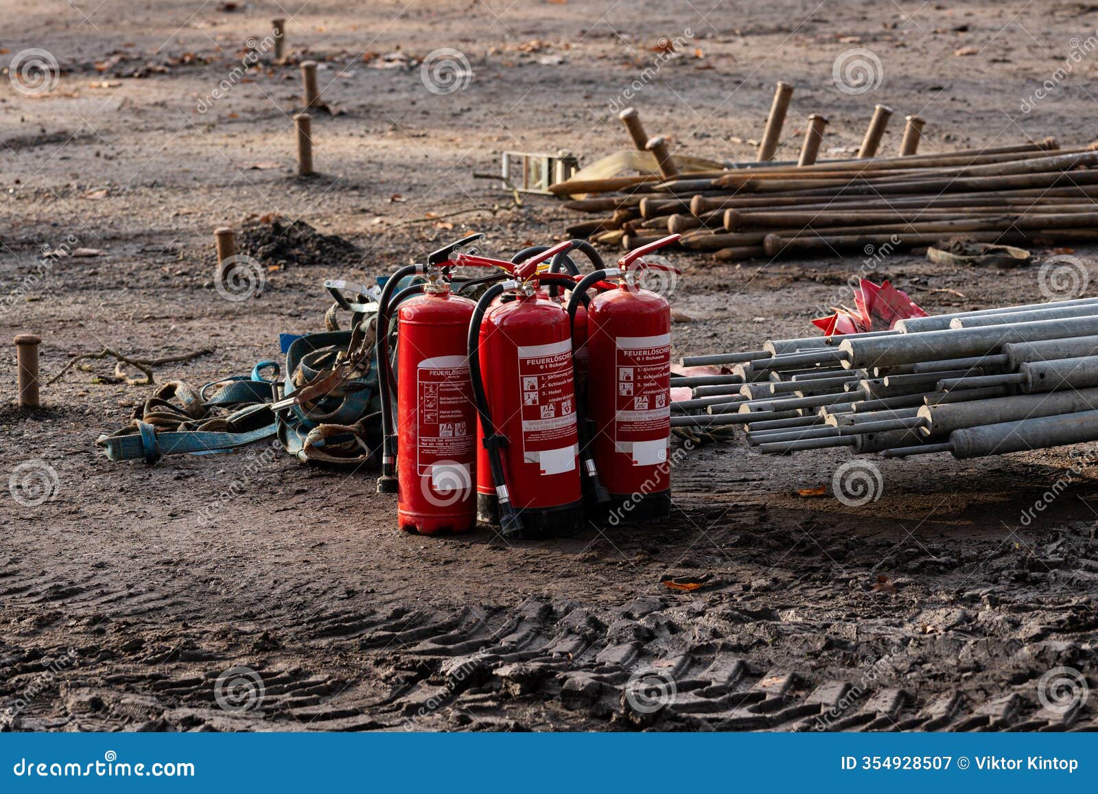 Fire Extinguishers and Construction Materials on a Worksite Stock Image ...