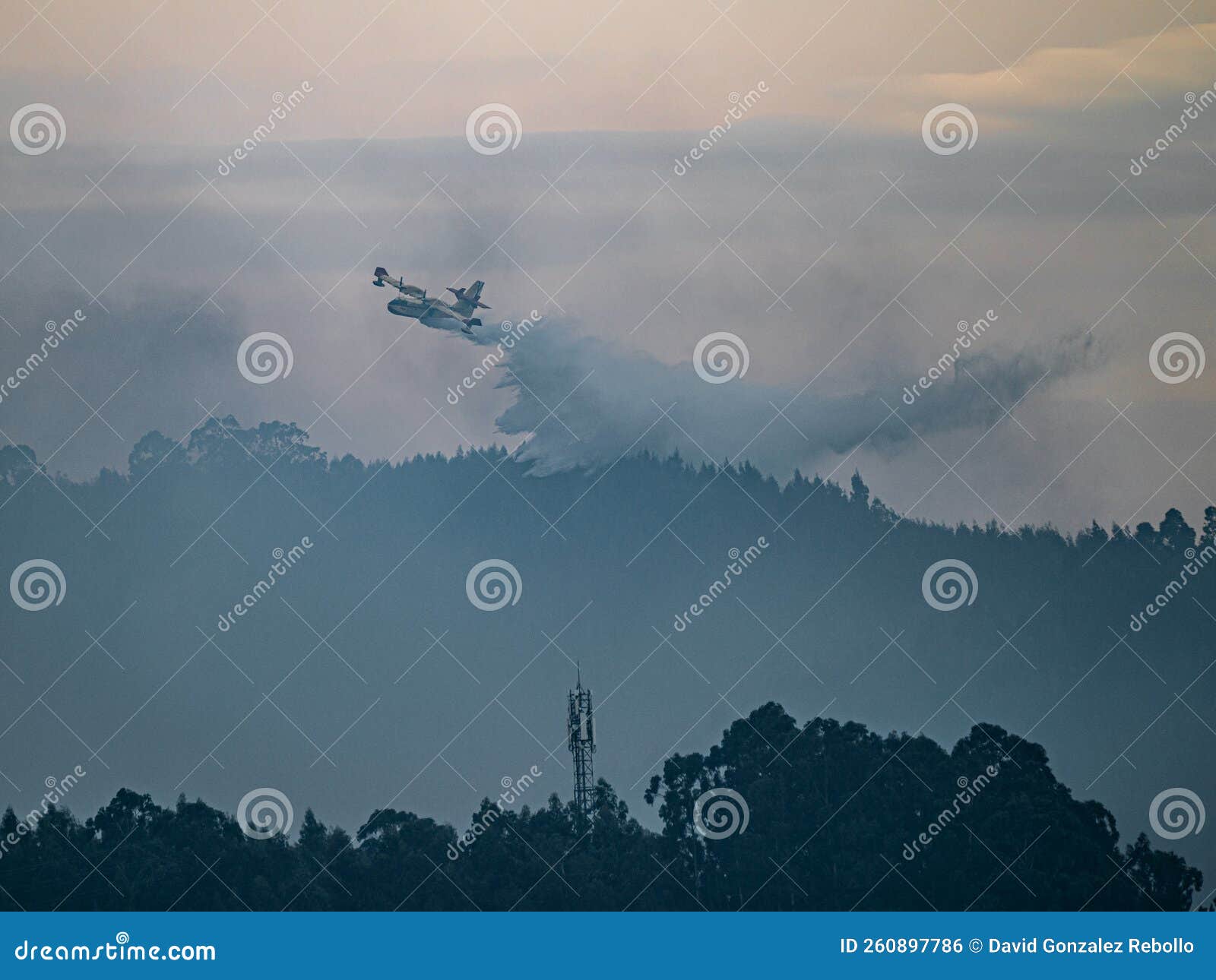 Fire Extinguishing Plane Water Bomber Dumping Its Load, Spain Stock ...