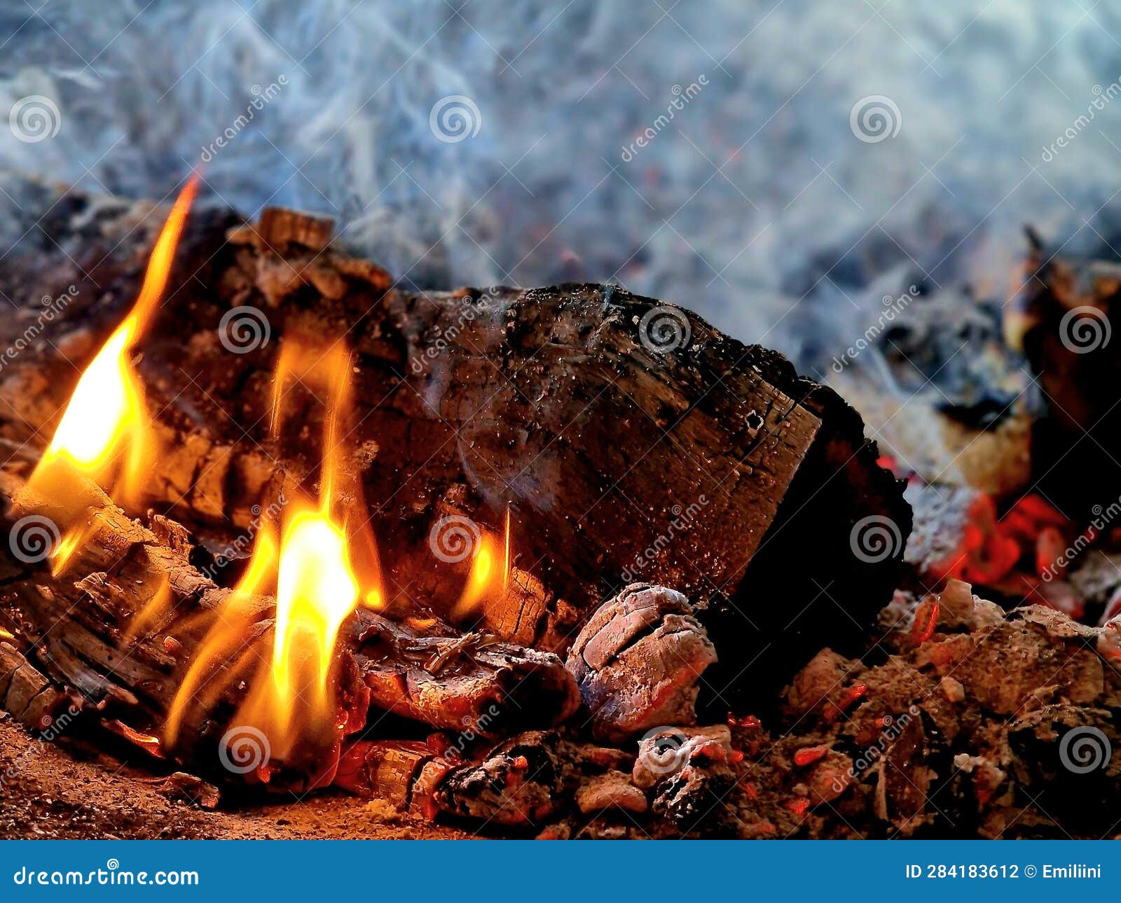 The Fire Fades from the Campfire Stock Photo - Image of embers, smoke ...