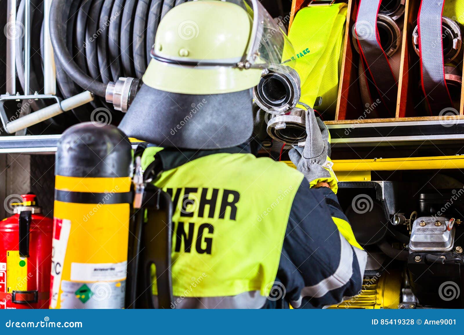 Fire Fighter with Breathing Protection and Oxygen Tank Stock Photo ...