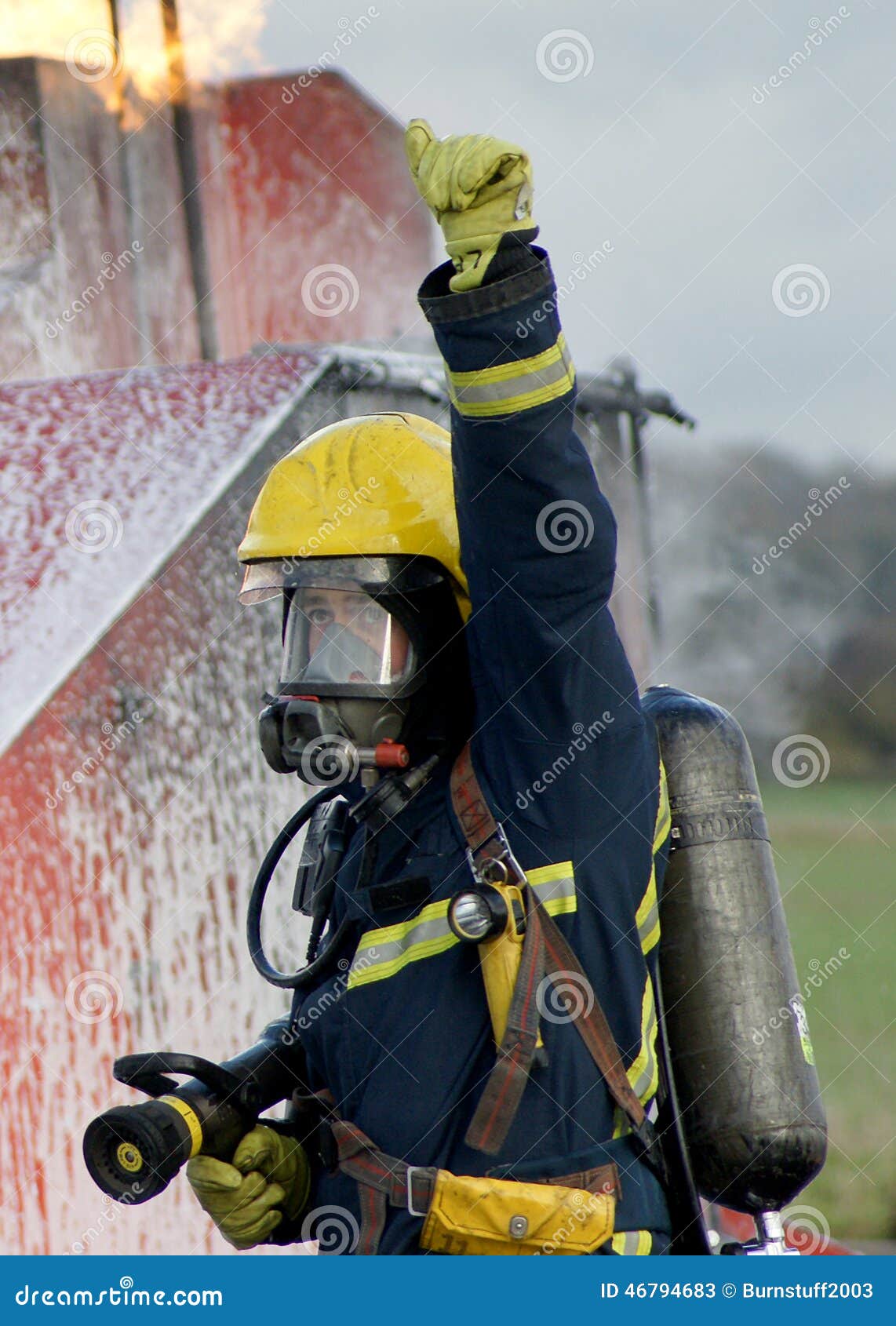 Fire fighter fighting fire editorial stock photo. Image of fire - 46794683
